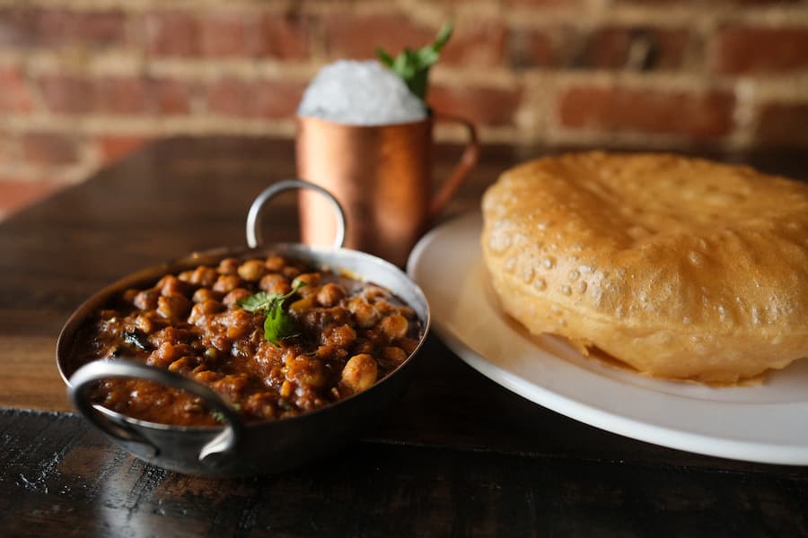 chole puri chickpeas tomatoes simmered w onions a blend of