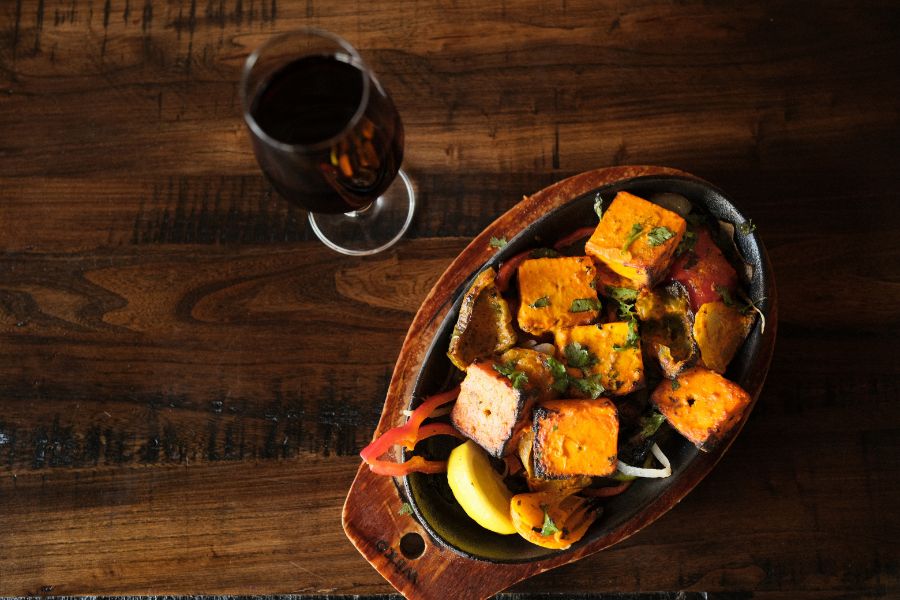 tandoori paneer tikka 6 pieces curd cheese marinated in a